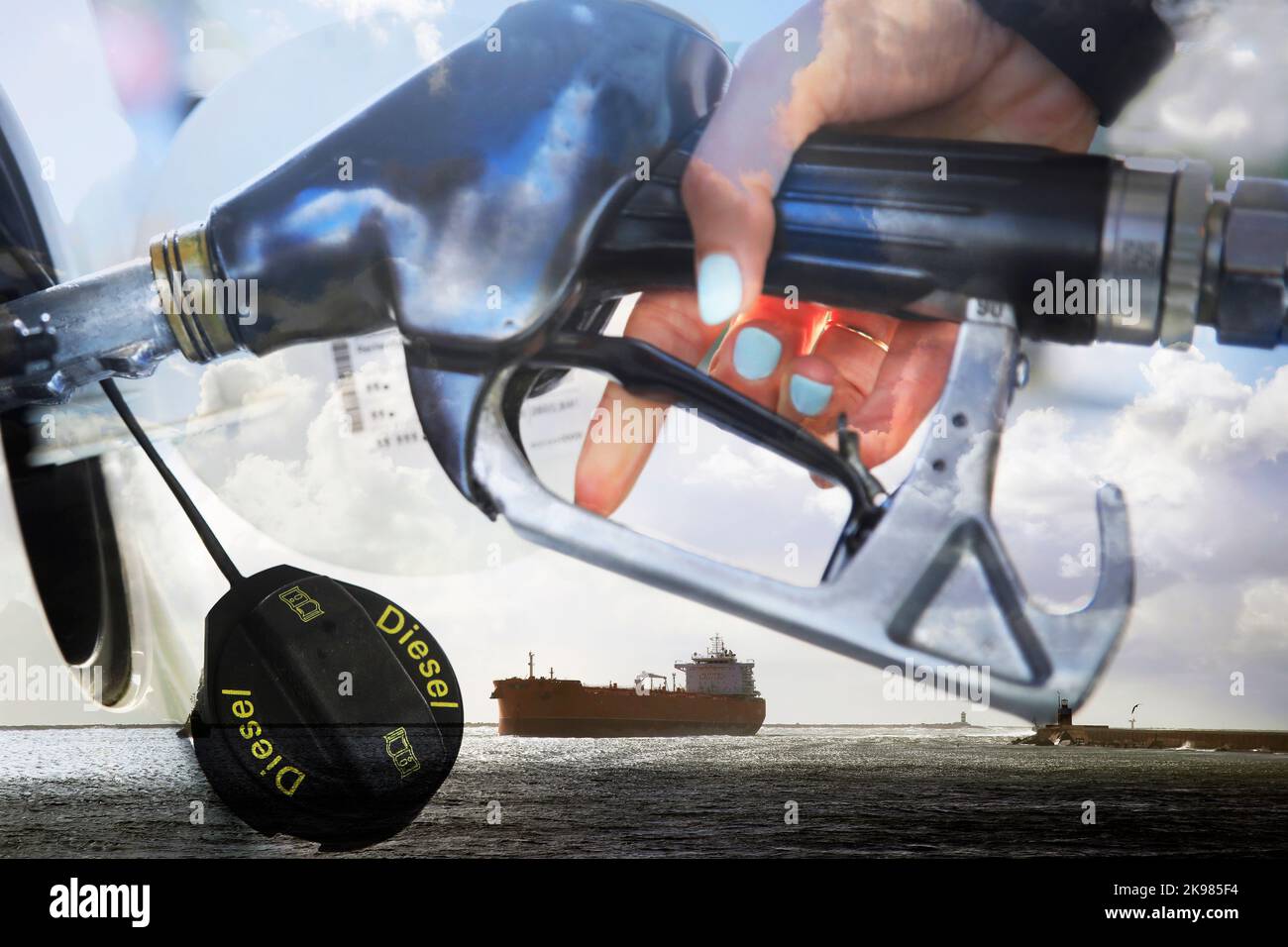 Close-up of a person refueling diesel at a petrol station Stock Photo ...