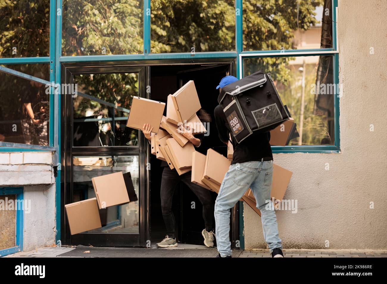 African man courier food delivery hi-res stock photography and images ...