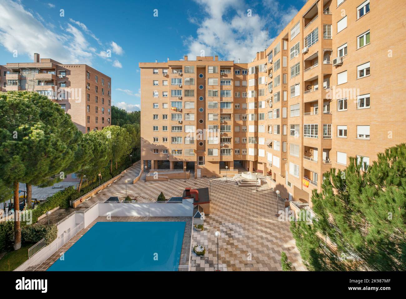 Facades of buildings of an urbanization with community pool Stock Photo ...