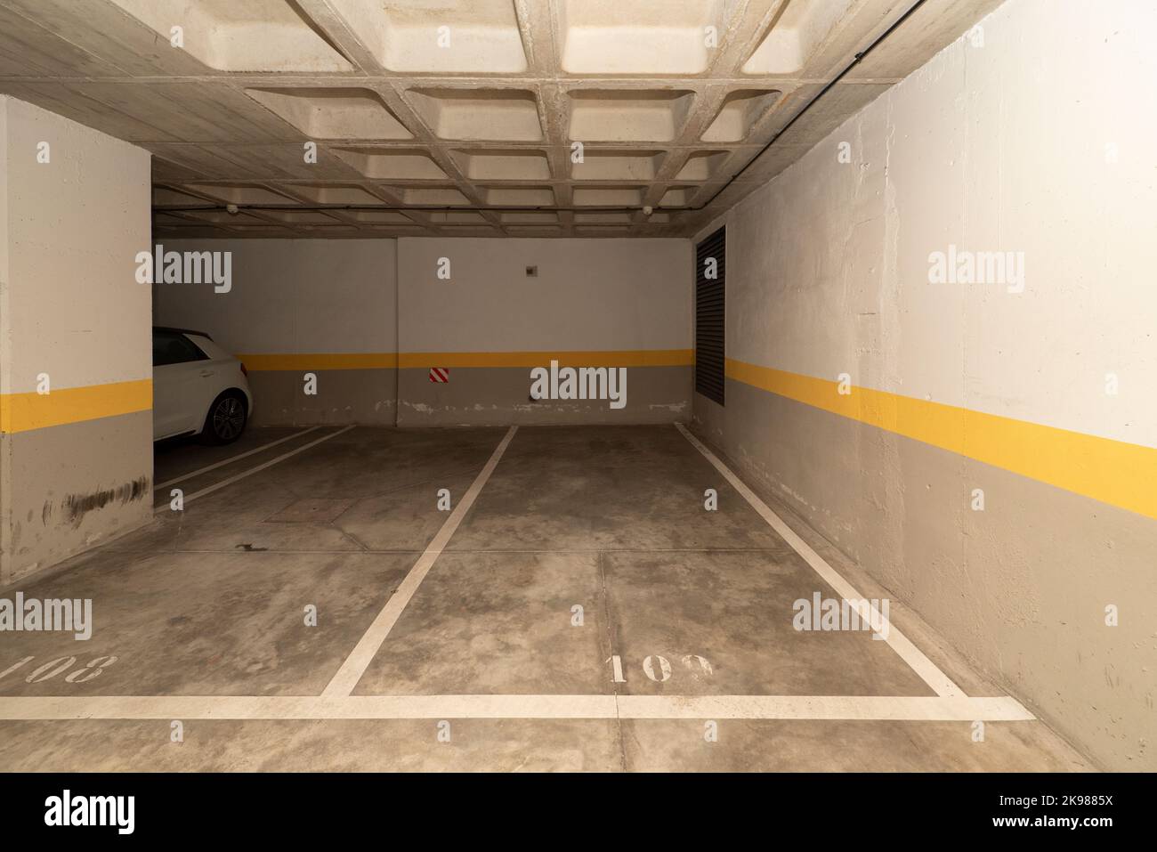 Empty parking space in an urban residential housing building Stock ...