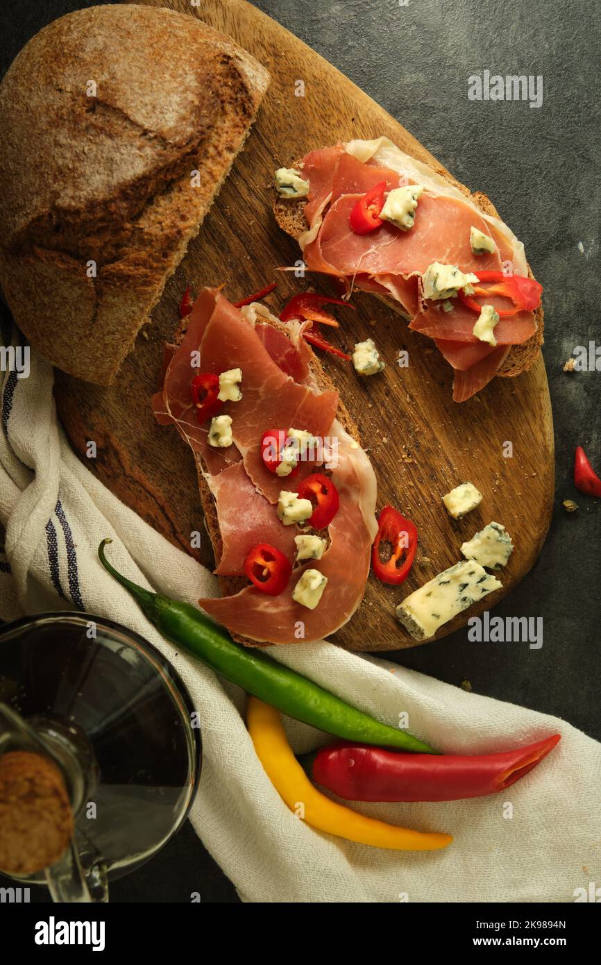 rye bread with slices of jamon and cheese Stock Photo - Alamy