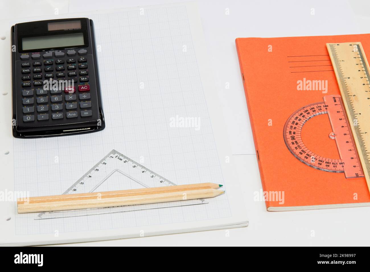 A calculator and other writing tools to show the concept of mathematics ...