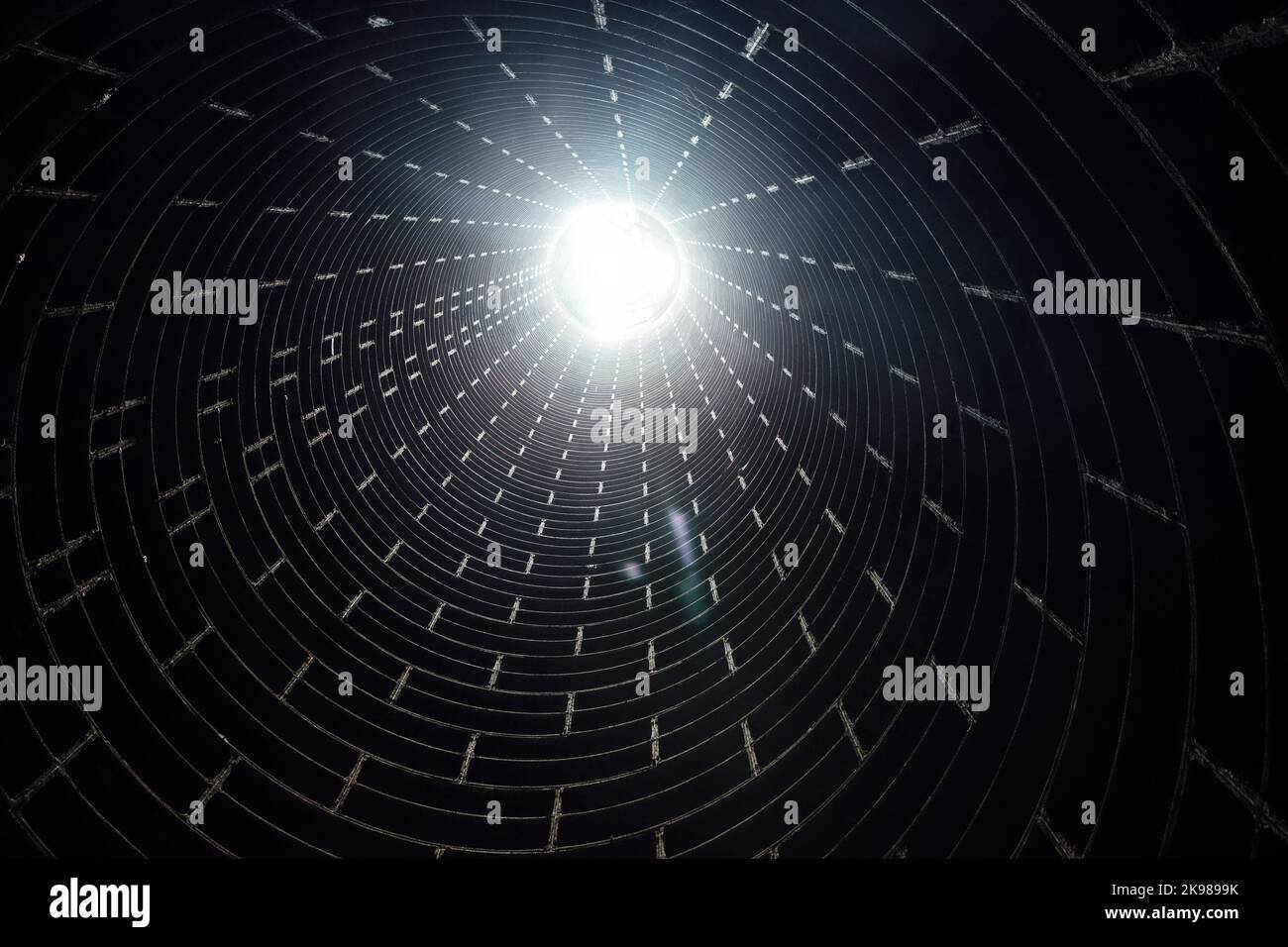 Vertical tubing shaft. Abstract light at the end of tube tunnel Stock ...