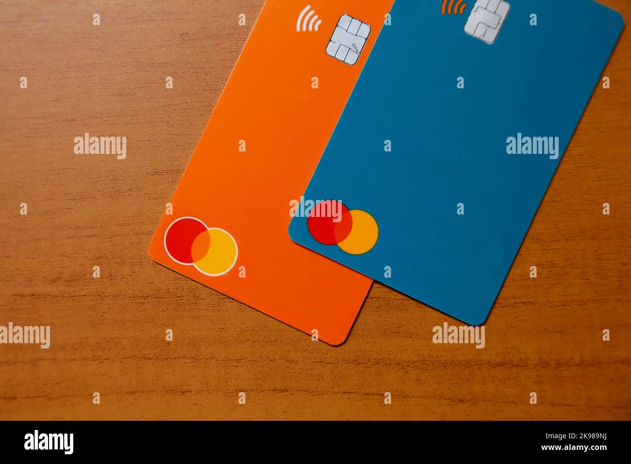 Minas Gerais, Brazil - July 09, 2022: green and orange credit cards ...