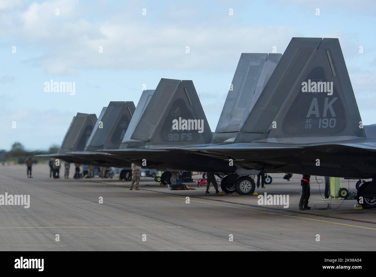Four U.S. Air Force F-22 Raptors assigned to the 90th Expeditionary ...