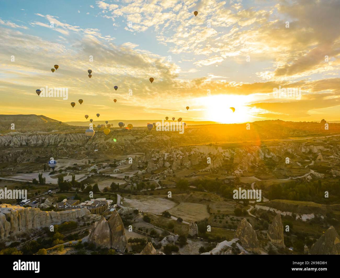 Ballooning concept. Stunning sunrise over the town of Cappadocia ...