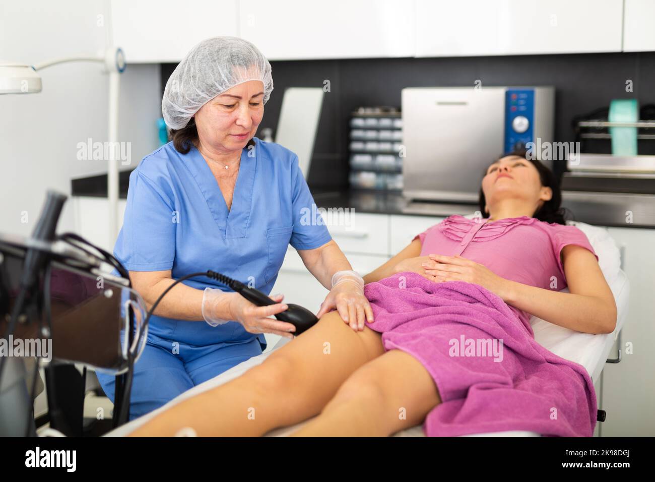 Highly qualified cosmetology doctor makes a young female patient of ...