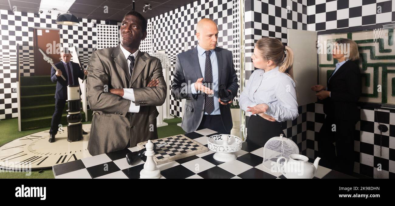 Confused man in escape room Stock Photo - Alamy