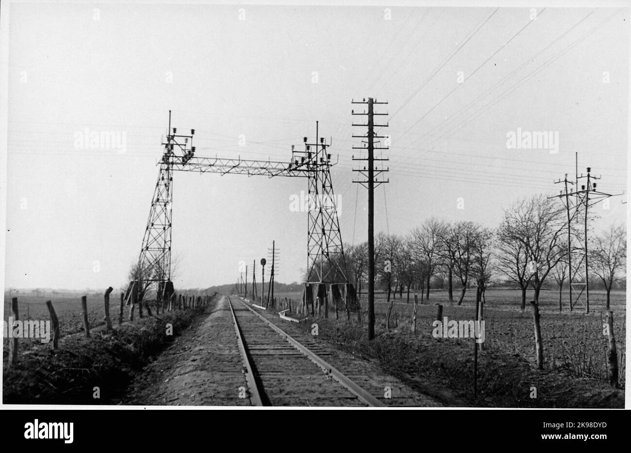 Power line crosses the railway Stock Photo - Alamy