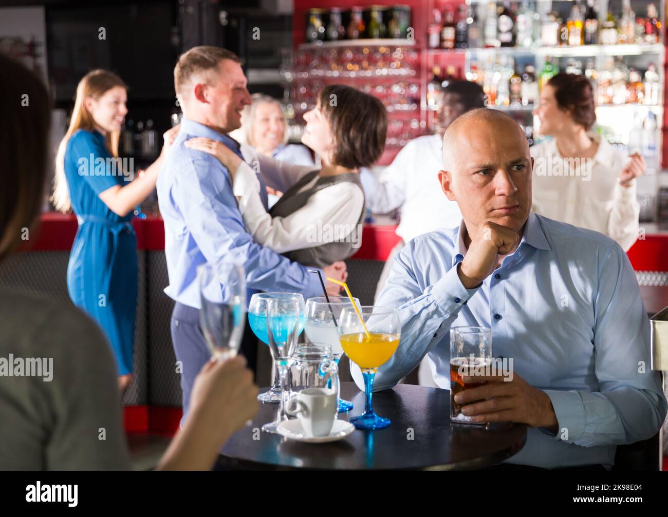 Man woman party sad hi-res stock photography and images - Alamy