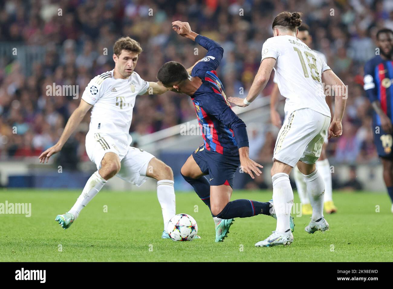Ferran torres of fc barcelona in action with thomas myller hi-res stock ...