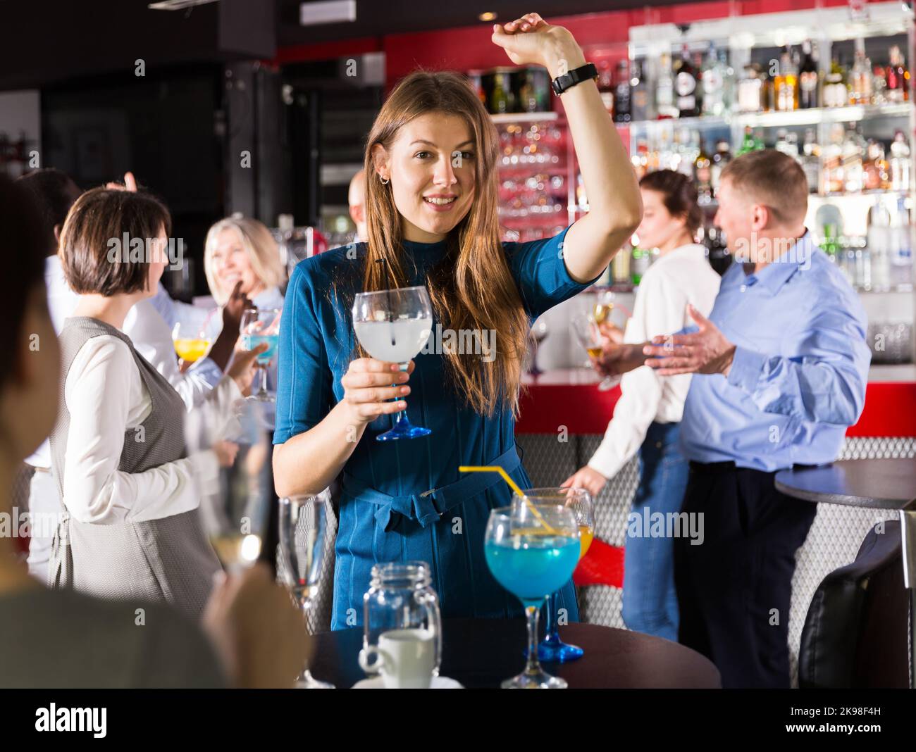 Woman dancing drinking hi-res stock photography and images - Alamy