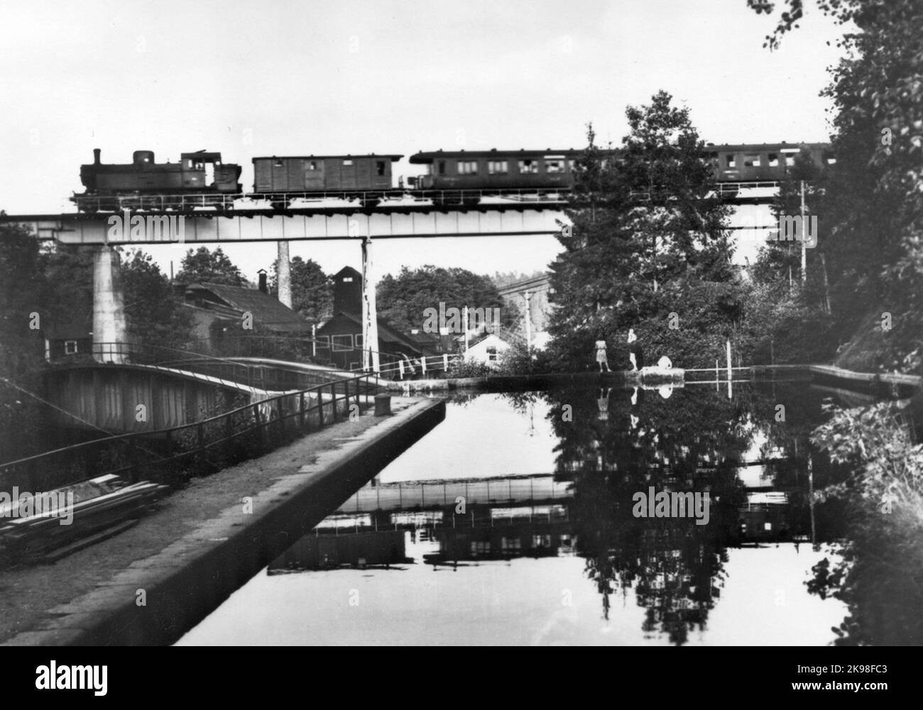 Håverud aqueduct with passenger trains and y3 locomotives against ...