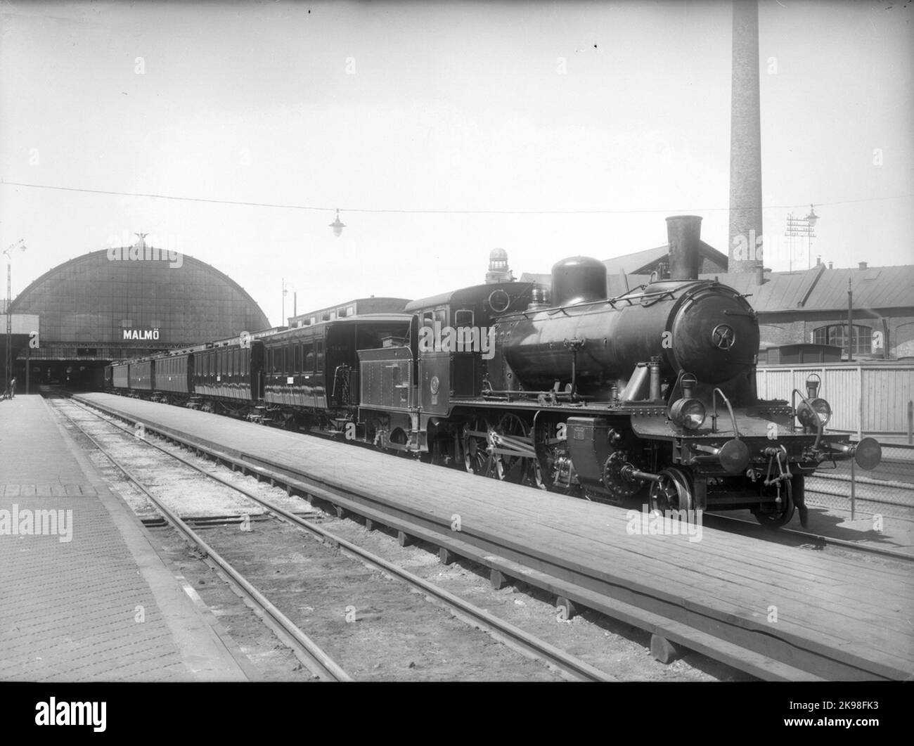 MSJ LOK 21. Steam locomotive with passenger train in Malmö station. The ...