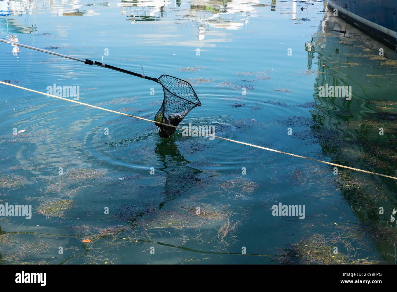 Trash collection waterway hi-res stock photography and images - Alamy
