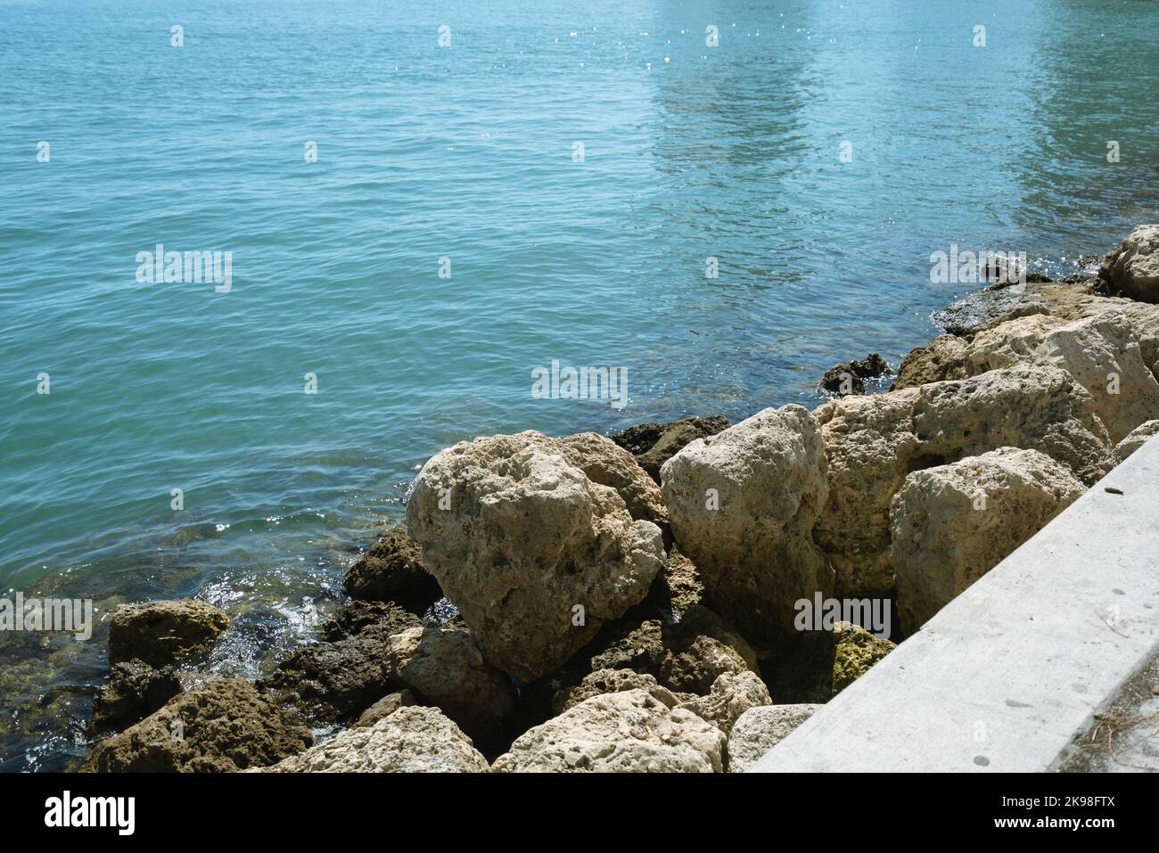 Rocks in Water at Bayfront park in Miami Stock Photo - Alamy