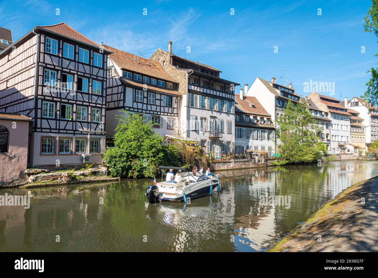 Traditional old alsatian houses on a canal in Strasbourg in Alsace in ...