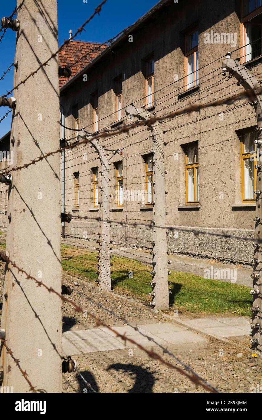 Electrified barbwire fences and building inside the Auschwitz I former ...