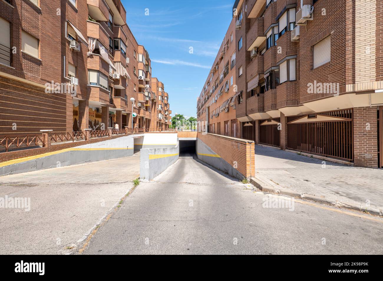Exit and entrance ramps to garages of an urban residential housing ...