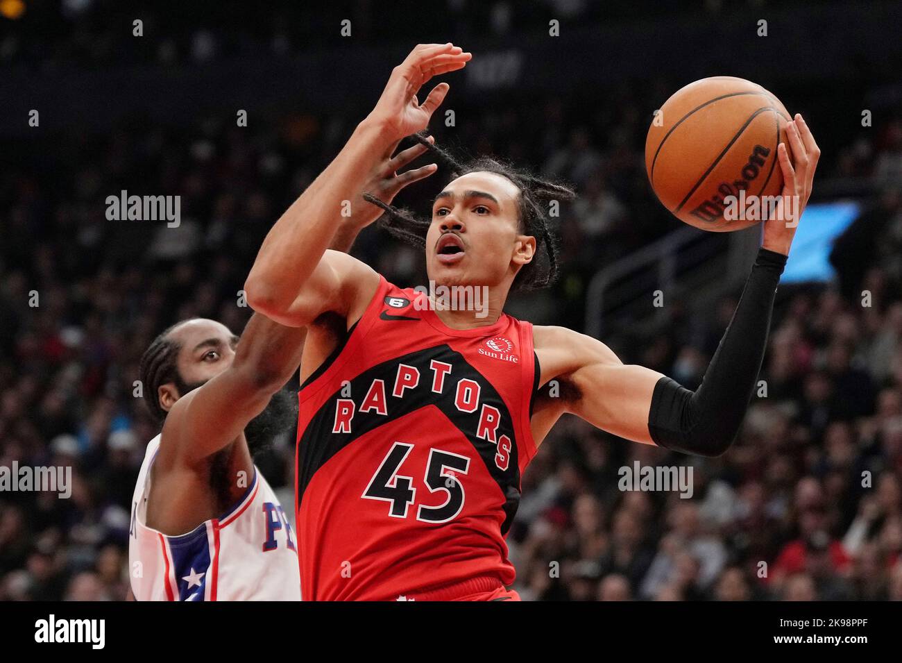 Toronto Raptors guard Dalano Banton (45) drives past Philadelphia 76ers ...