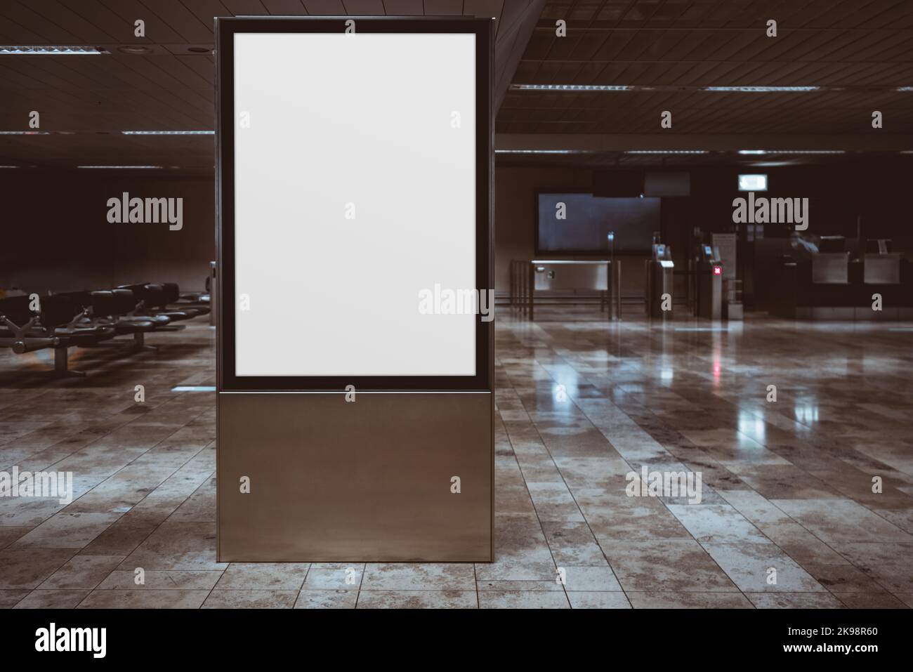 View of a vertical empty indoor advertising billboard mockup; a blank ...