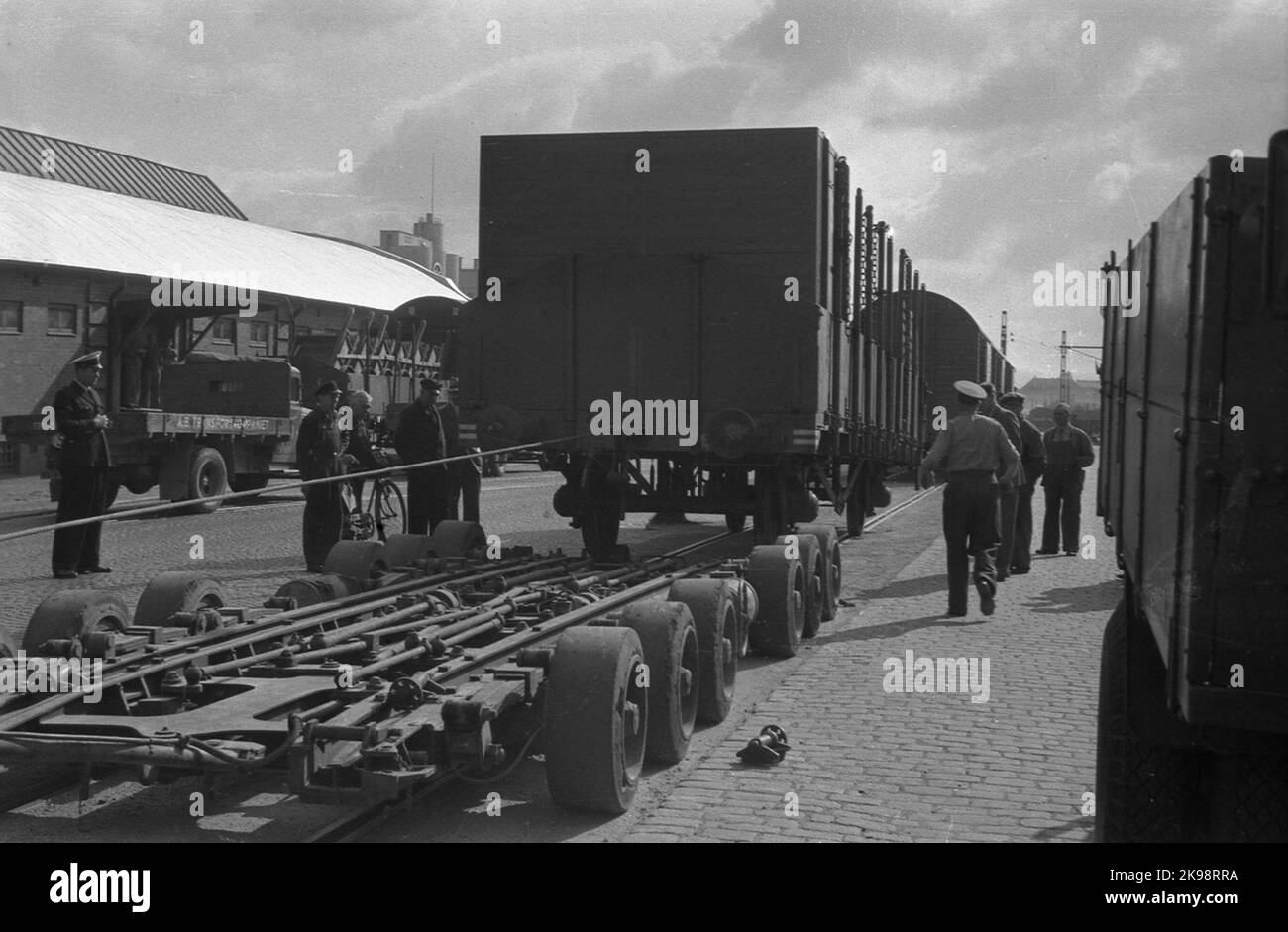Freight wagon is loaded on carriage Stock Photo - Alamy