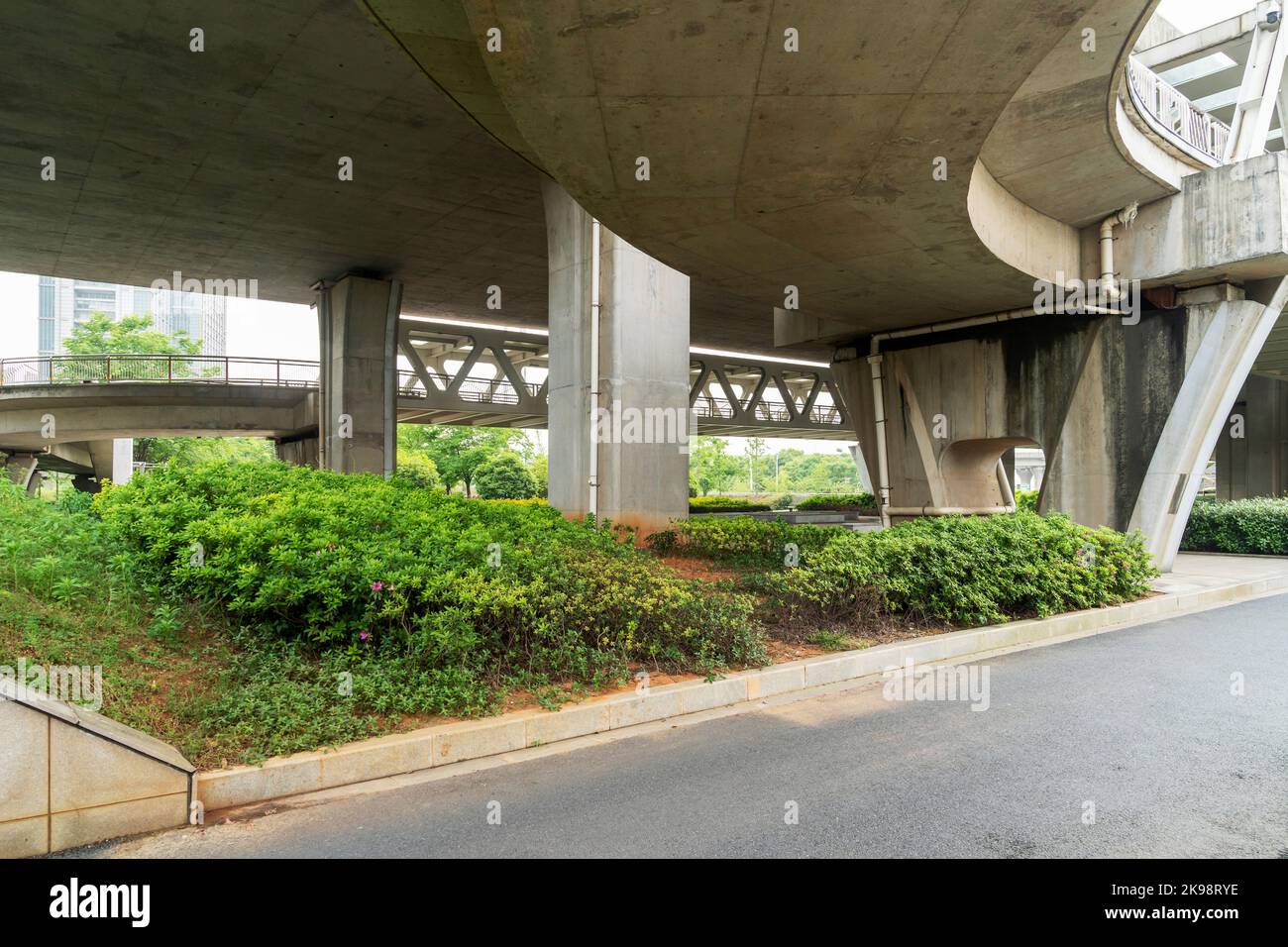 Concrete structure and asphalt road space under the overpass in the ...