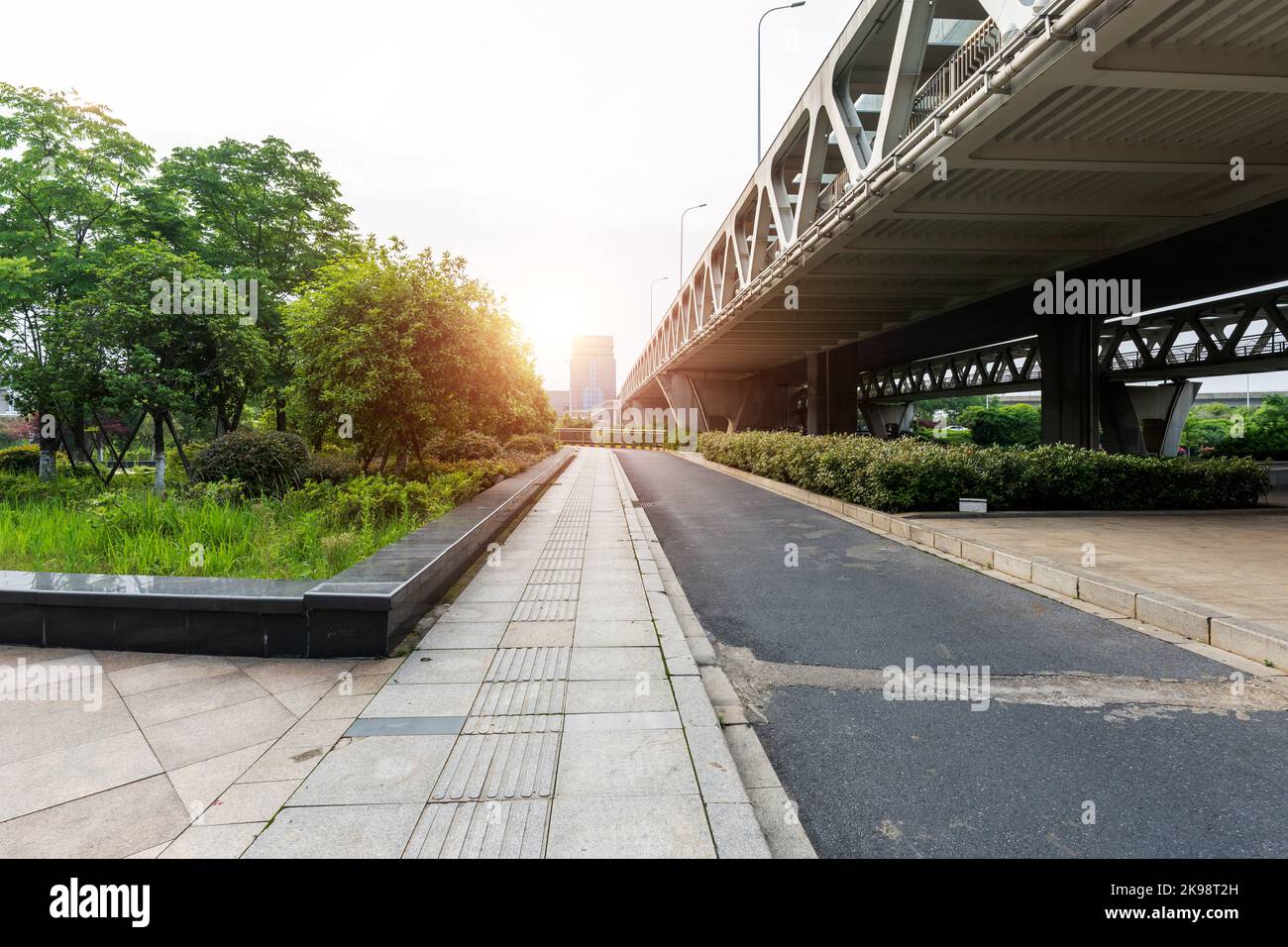 Concrete structure and asphalt road space under the overpass in the ...