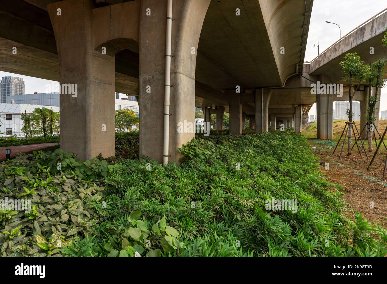 Concrete structure and asphalt road space under the overpass in the ...