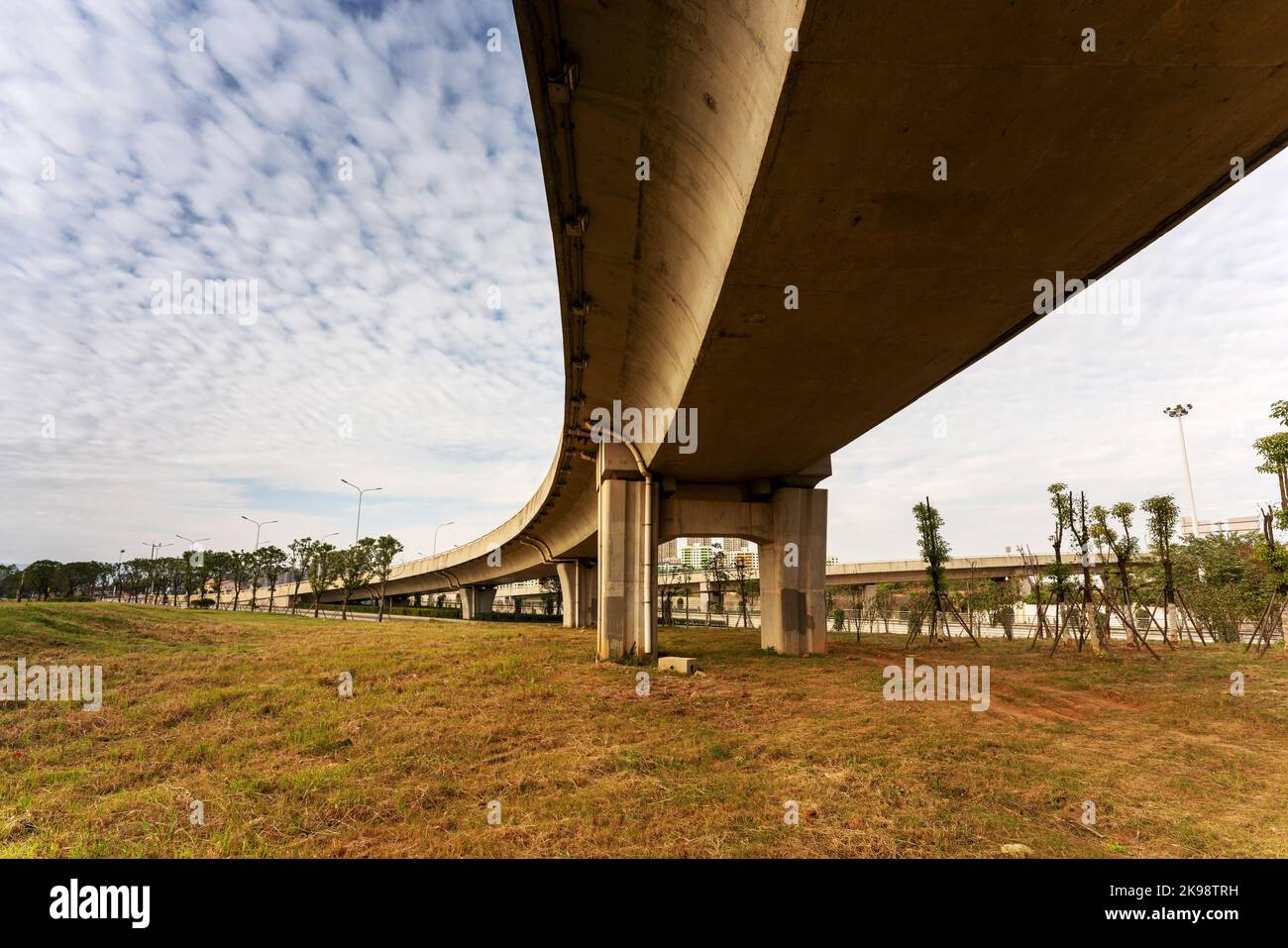 Concrete structure and asphalt road space under the overpass in the ...