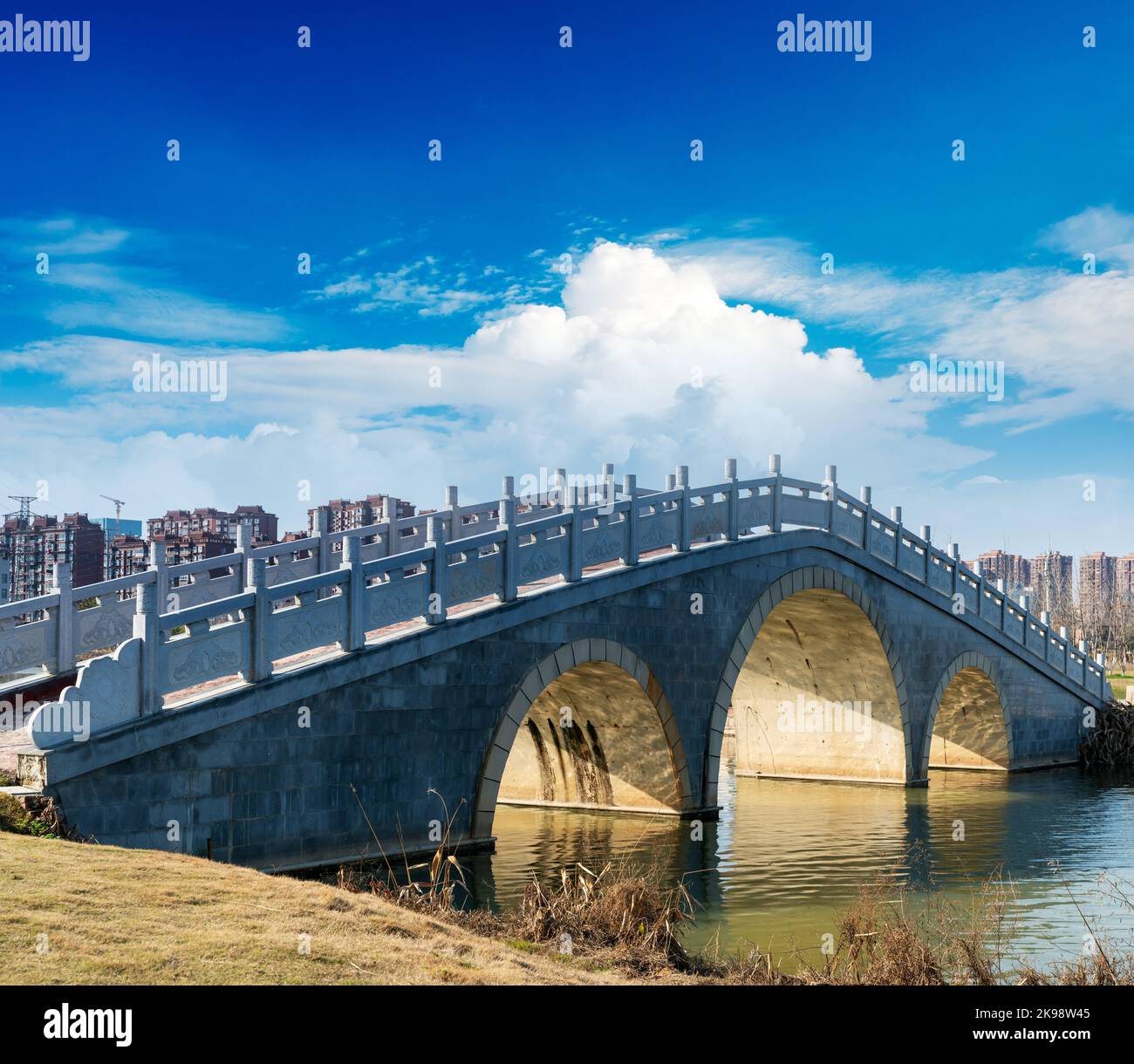 stone footbridge in an Asian garden Stock Photo - Alamy