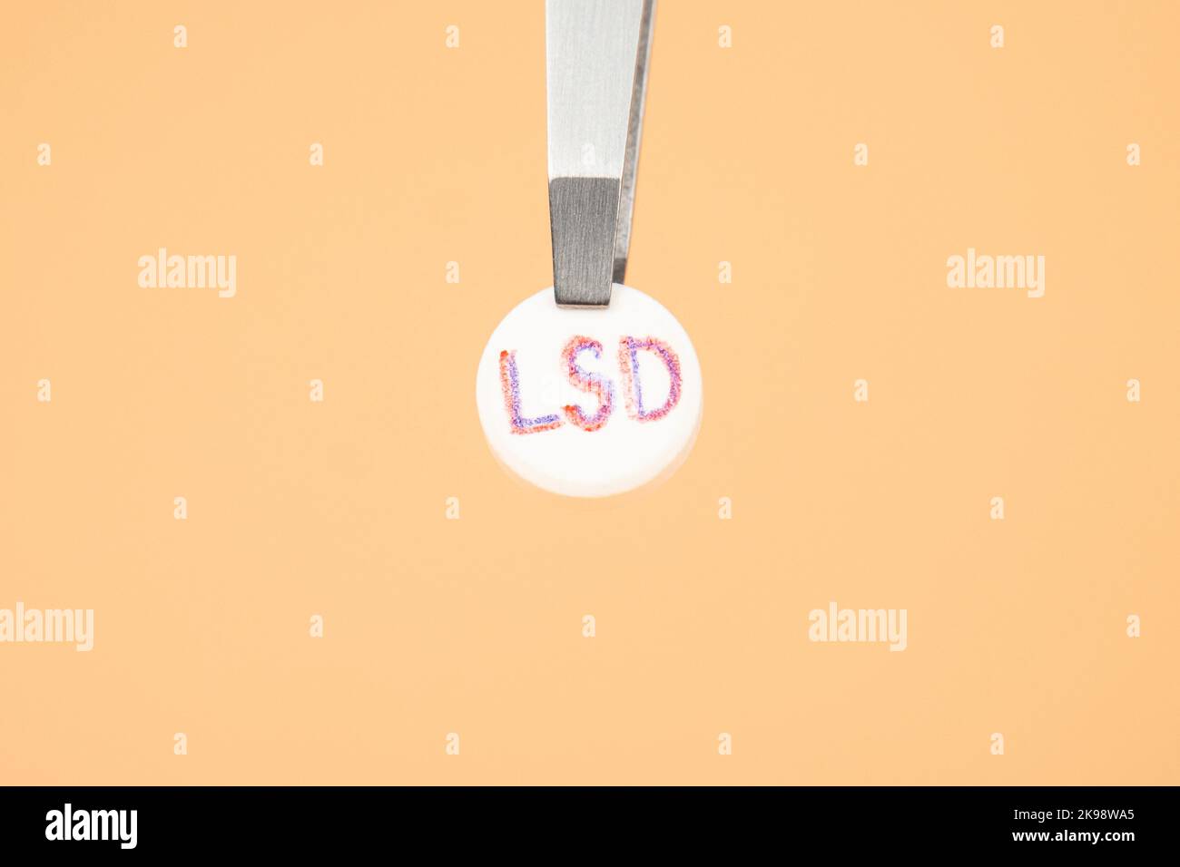 lsd medical tablet closeup, lysergic acid pill psychedelic drug on ...