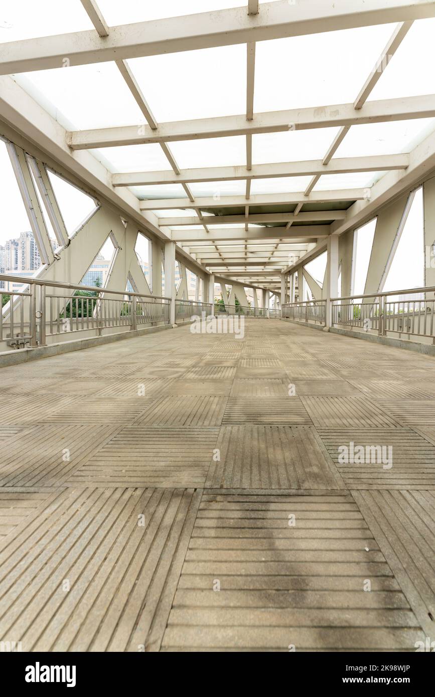 Inside of a modern overhead pedestrian bridge Stock Photo - Alamy
