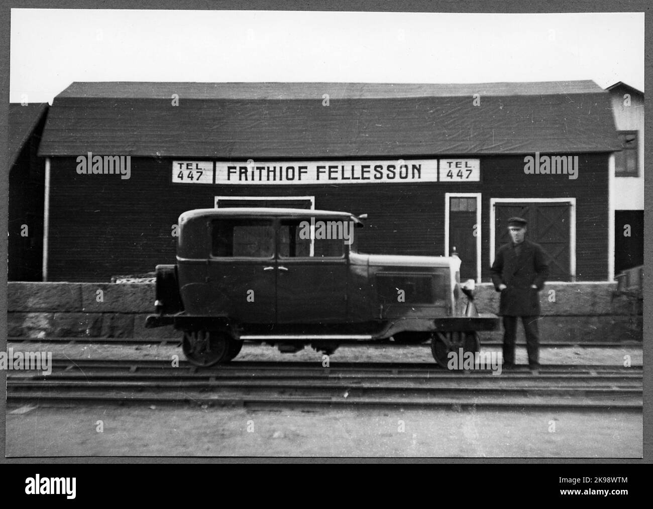 Frithiof Fellesson's timber shop with a picture dress in front in Växjö ...