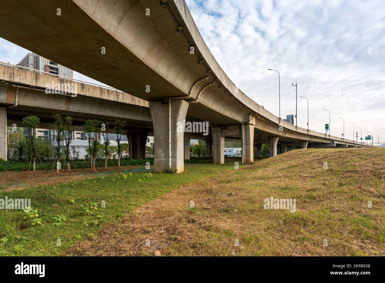 Concrete structure and asphalt road space under the overpass in the ...