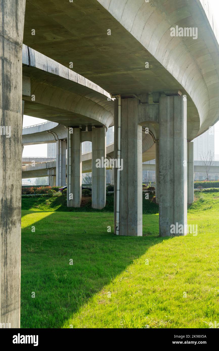 Concrete structure and asphalt road space under the overpass in the ...