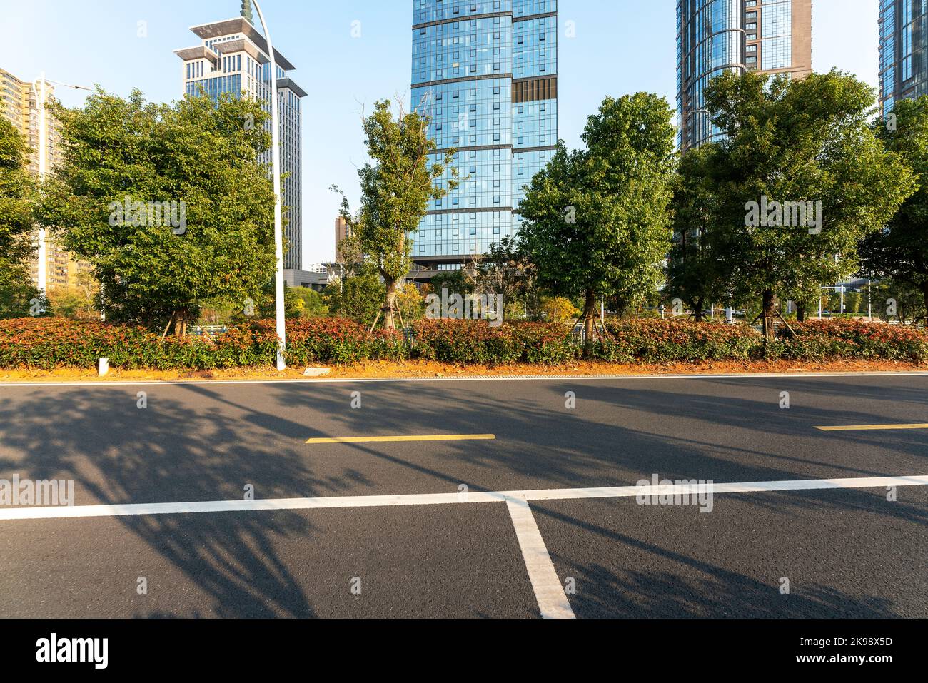 Empty urban road and buildings in the city Stock Photo - Alamy