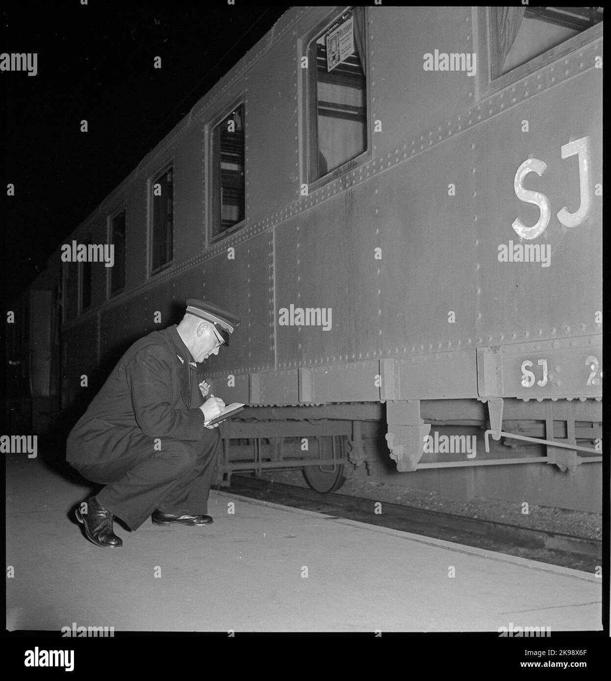Inspection of passenger car Stock Photo - Alamy