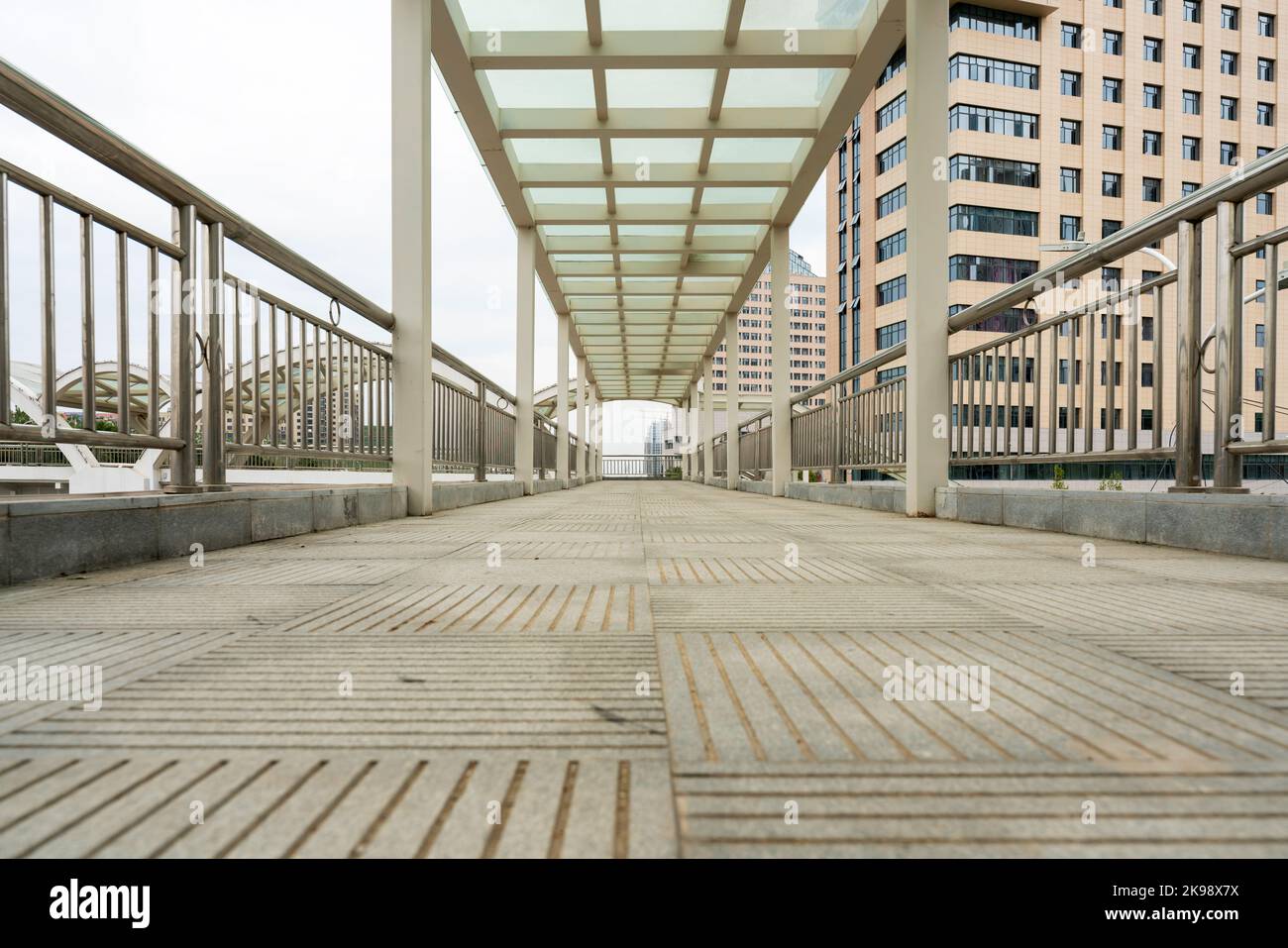 Inside of a modern overhead pedestrian bridge Stock Photo - Alamy