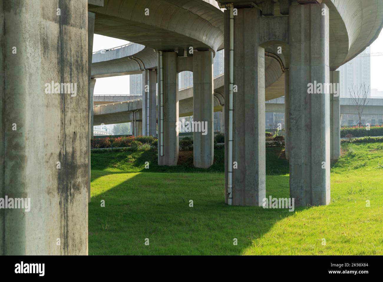 Concrete structure and asphalt road space under the overpass in the ...