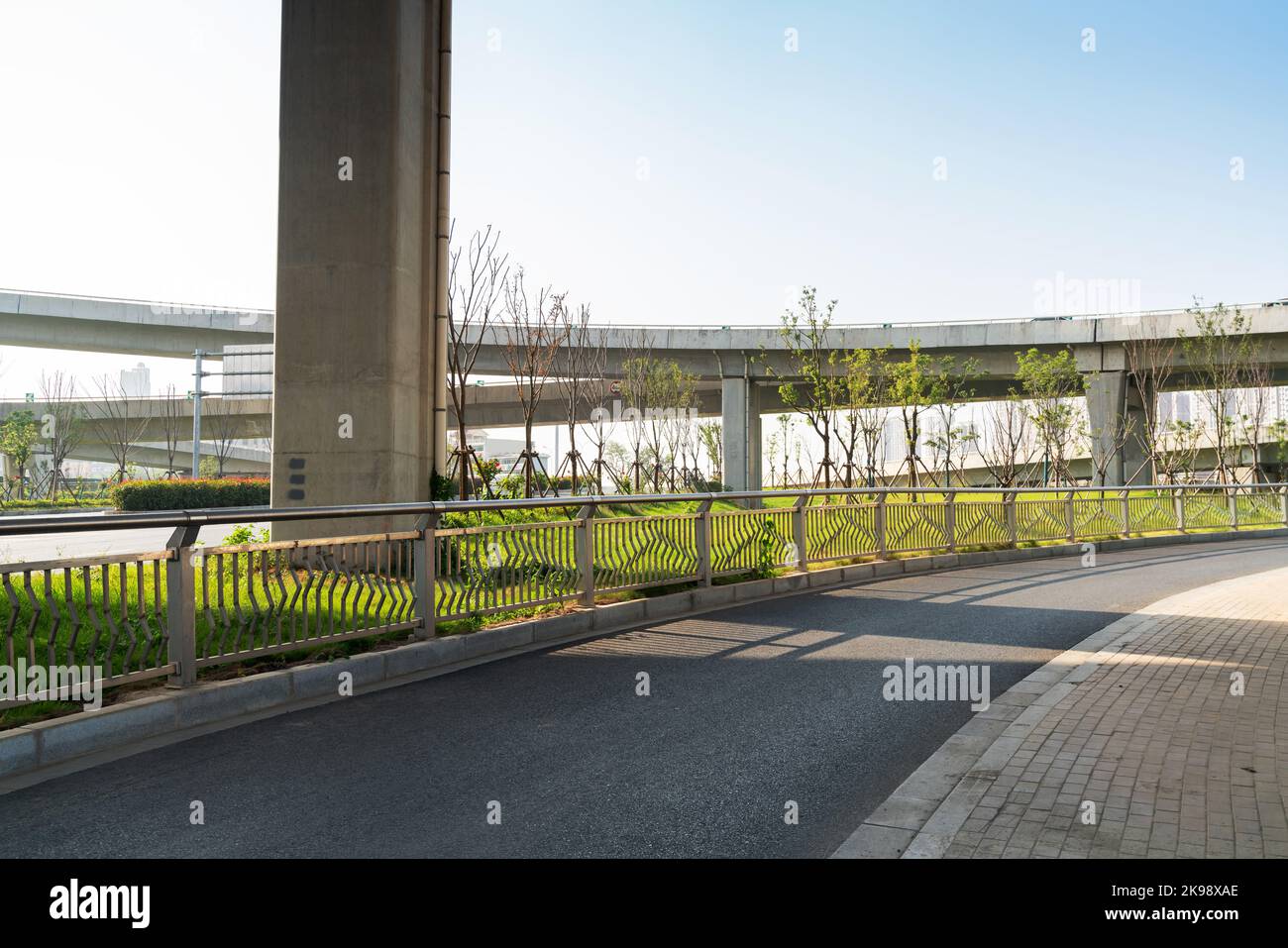 Concrete structure and asphalt road space under the overpass in the ...