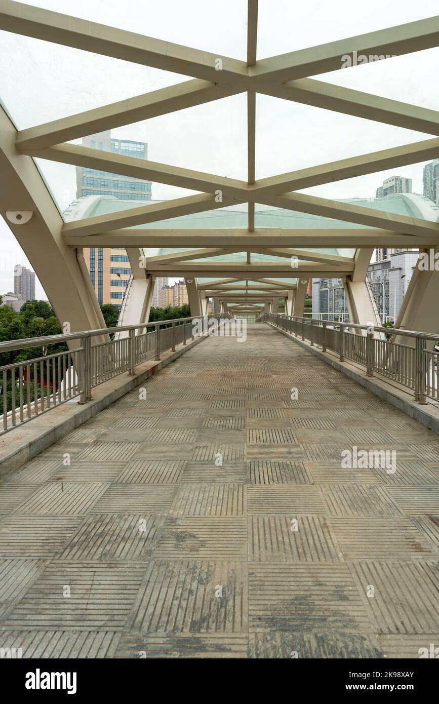 Inside of a modern overhead pedestrian bridge Stock Photo - Alamy