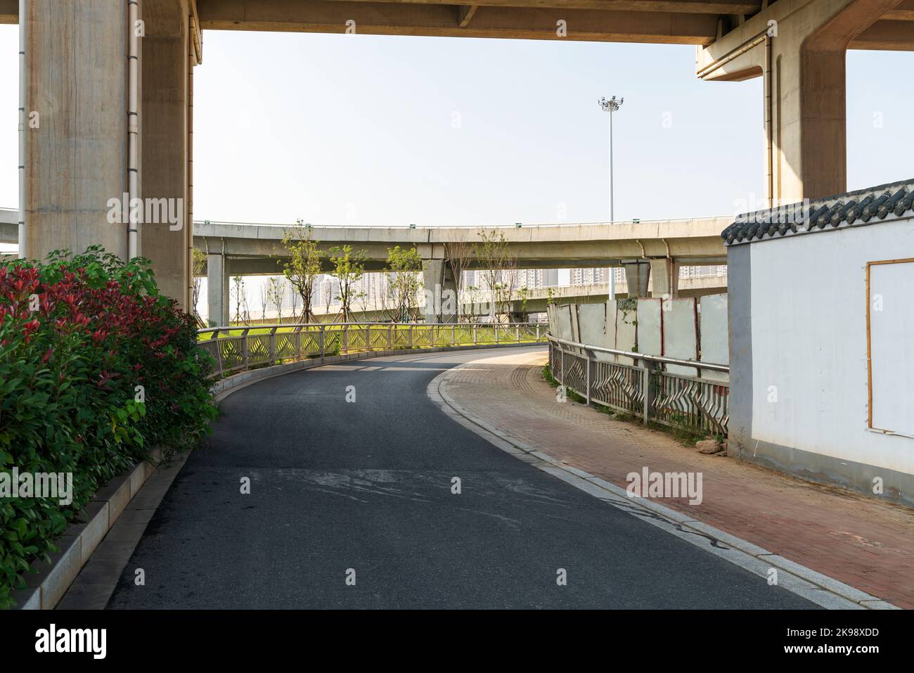 Concrete structure and asphalt road space under the overpass in the ...
