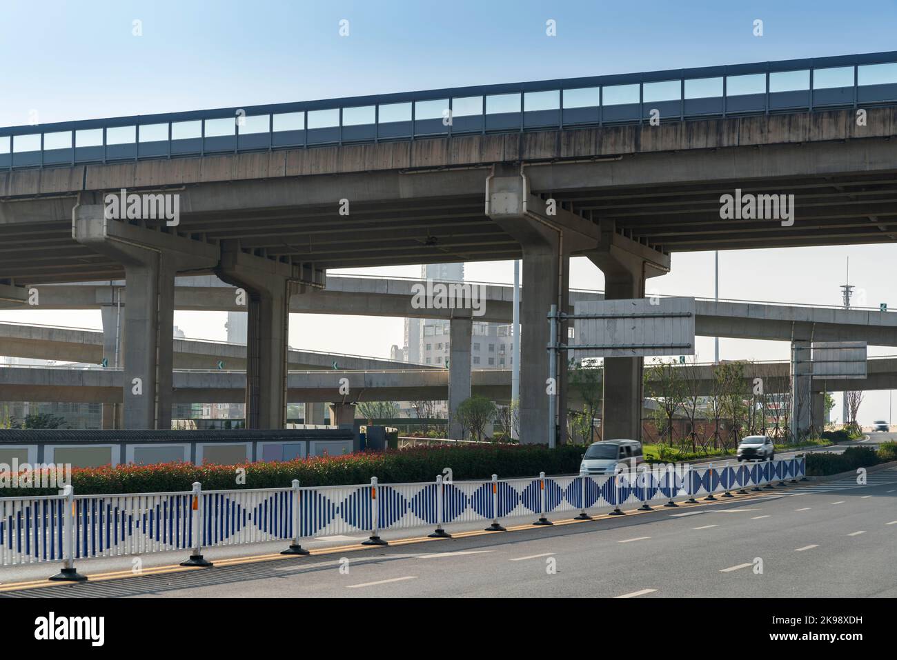 Concrete structure and asphalt road space under the overpass in the ...