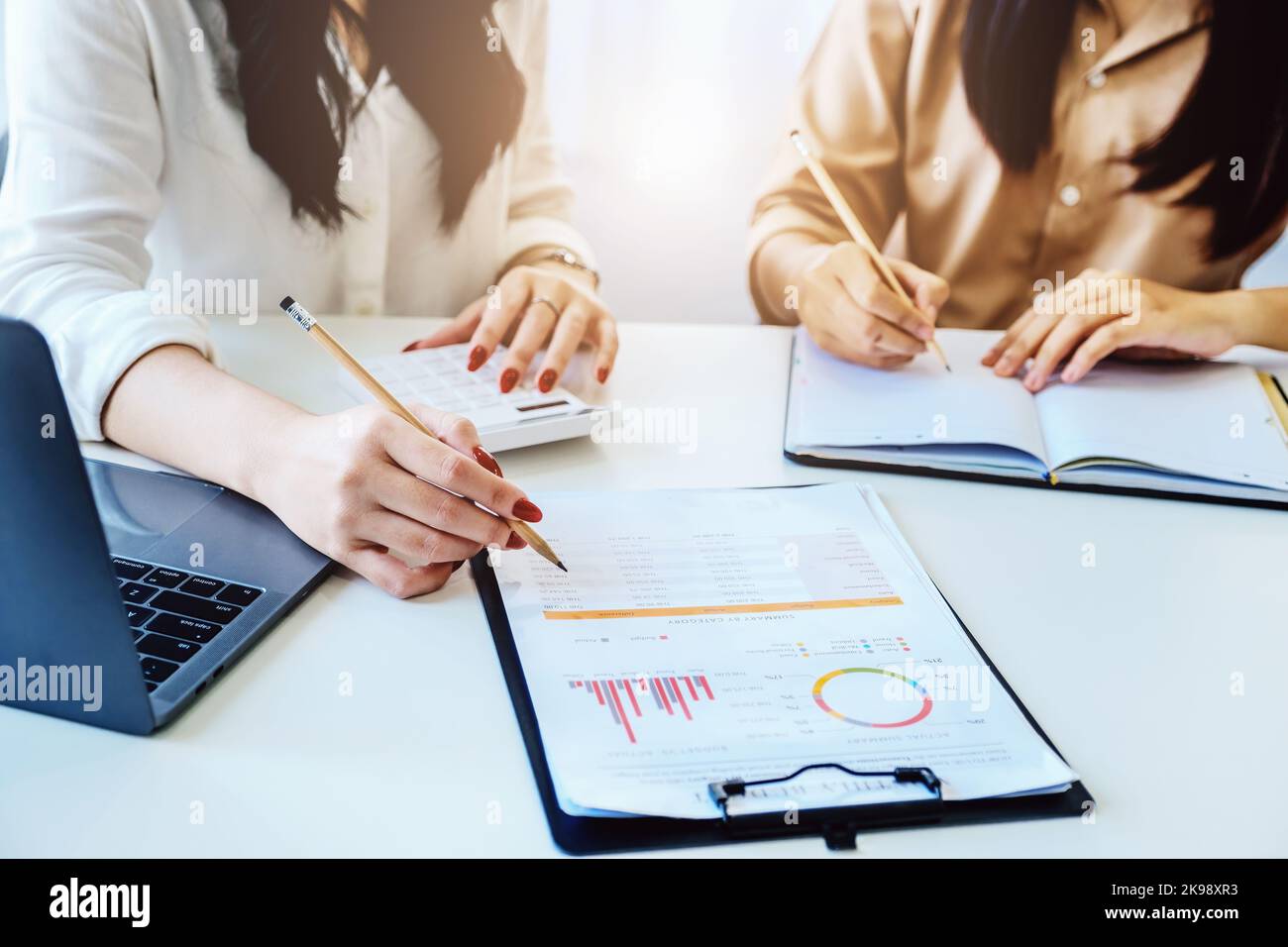 Negotiation, Analysis, Discussion, Asian woman economist and marketer ...