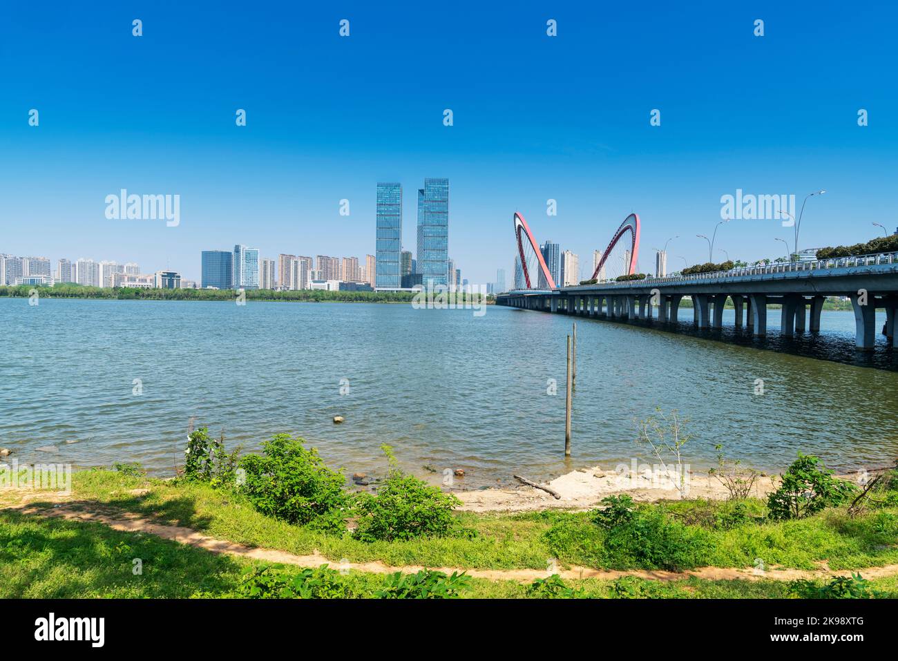 Lakeside modern office building in China Stock Photo - Alamy