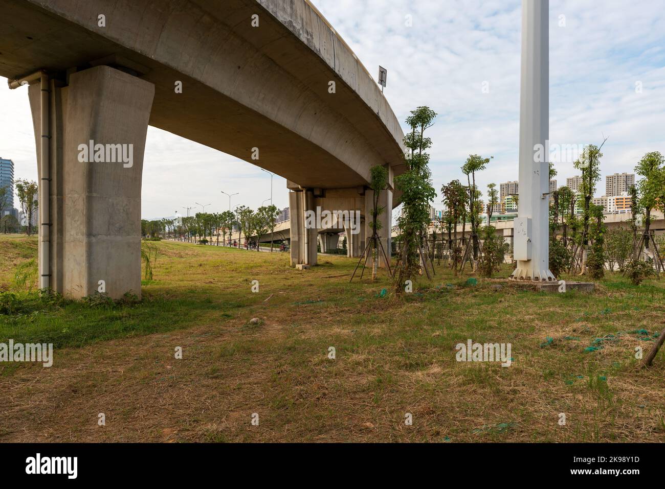 Concrete structure and asphalt road space under the overpass in the ...