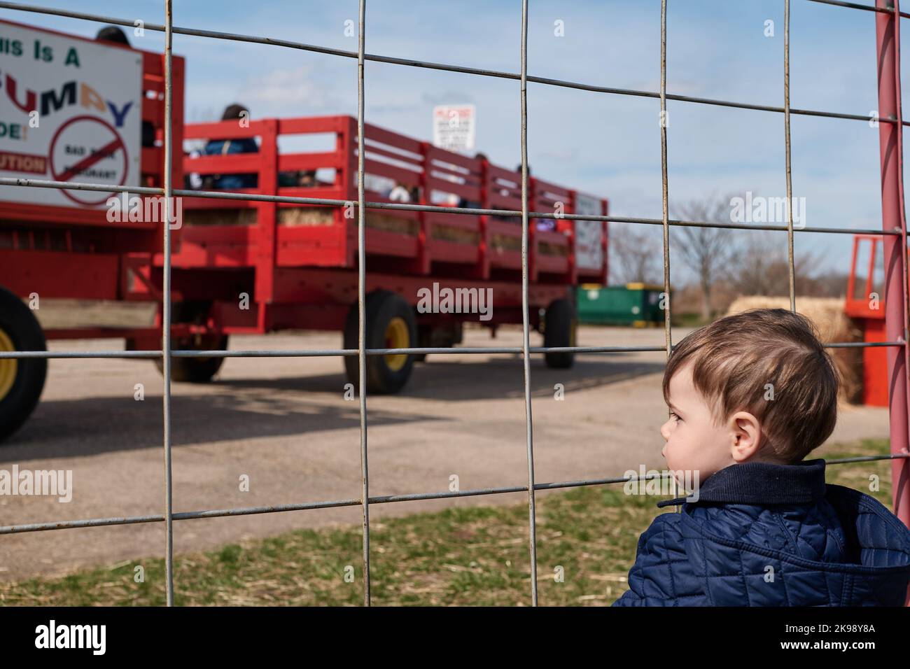 Masked mom with kids at the county fair Stock Photo - Alamy