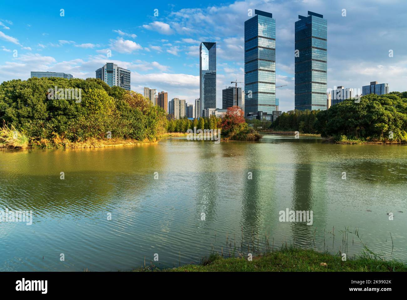 Lakeside modern office building in China Stock Photo - Alamy