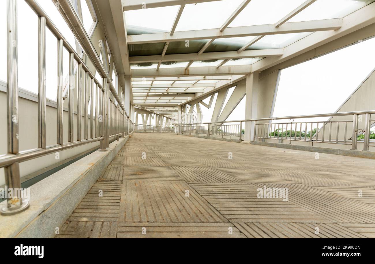 Inside of a modern overhead pedestrian bridge Stock Photo - Alamy